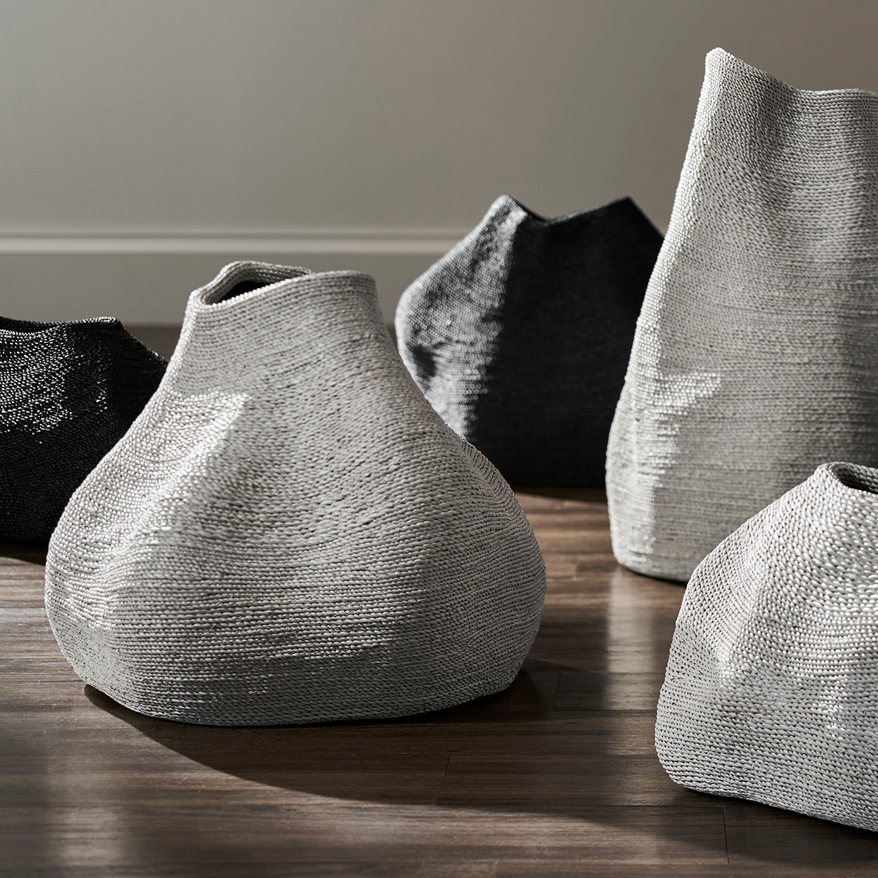 Hand-woven lampakanay rope wrapped over a metal frame in a white-wash ...