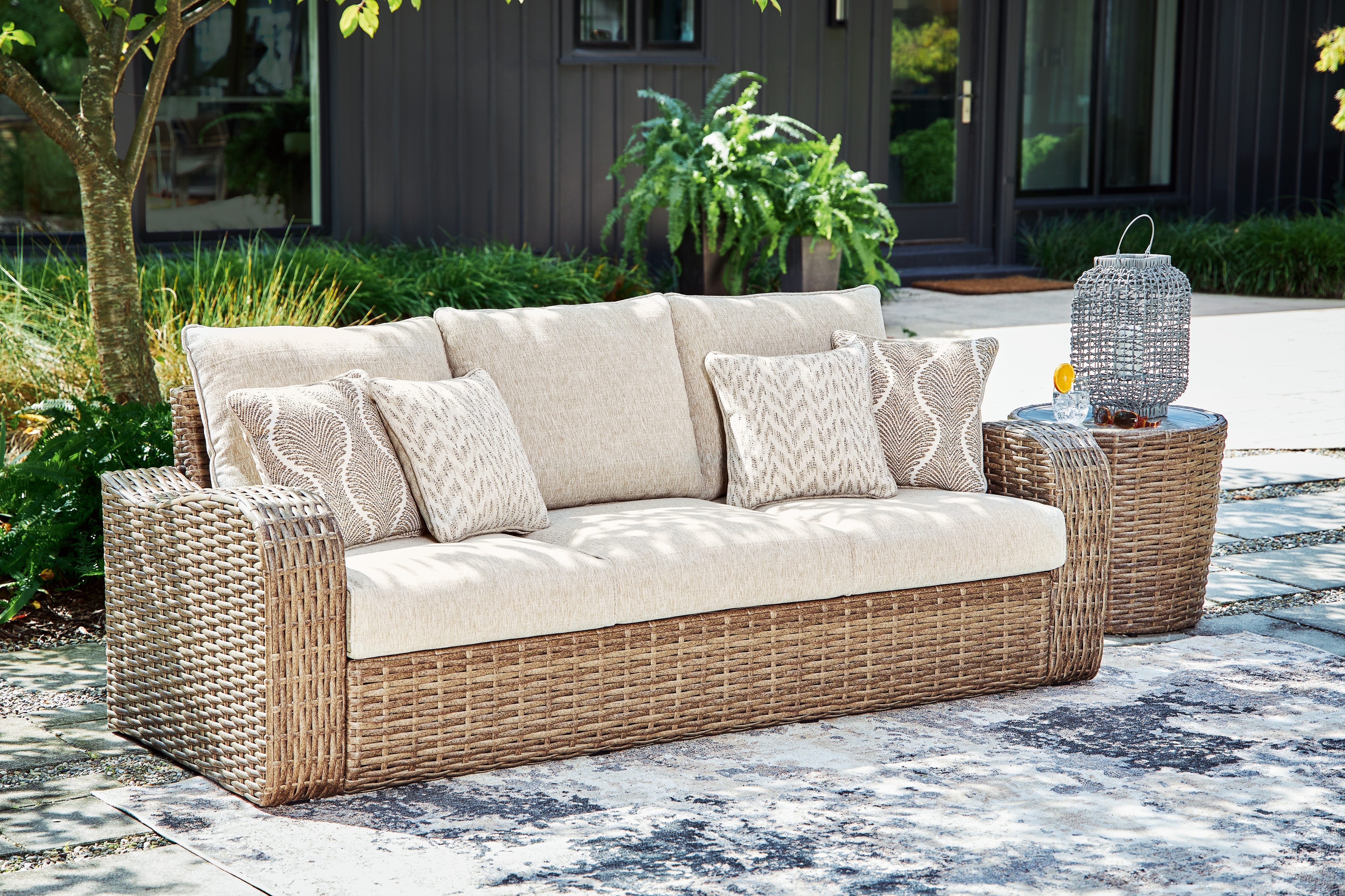 Signature Design by Ashley Outdoor Furniture Sandy Bloom Outdoor Sofa ...