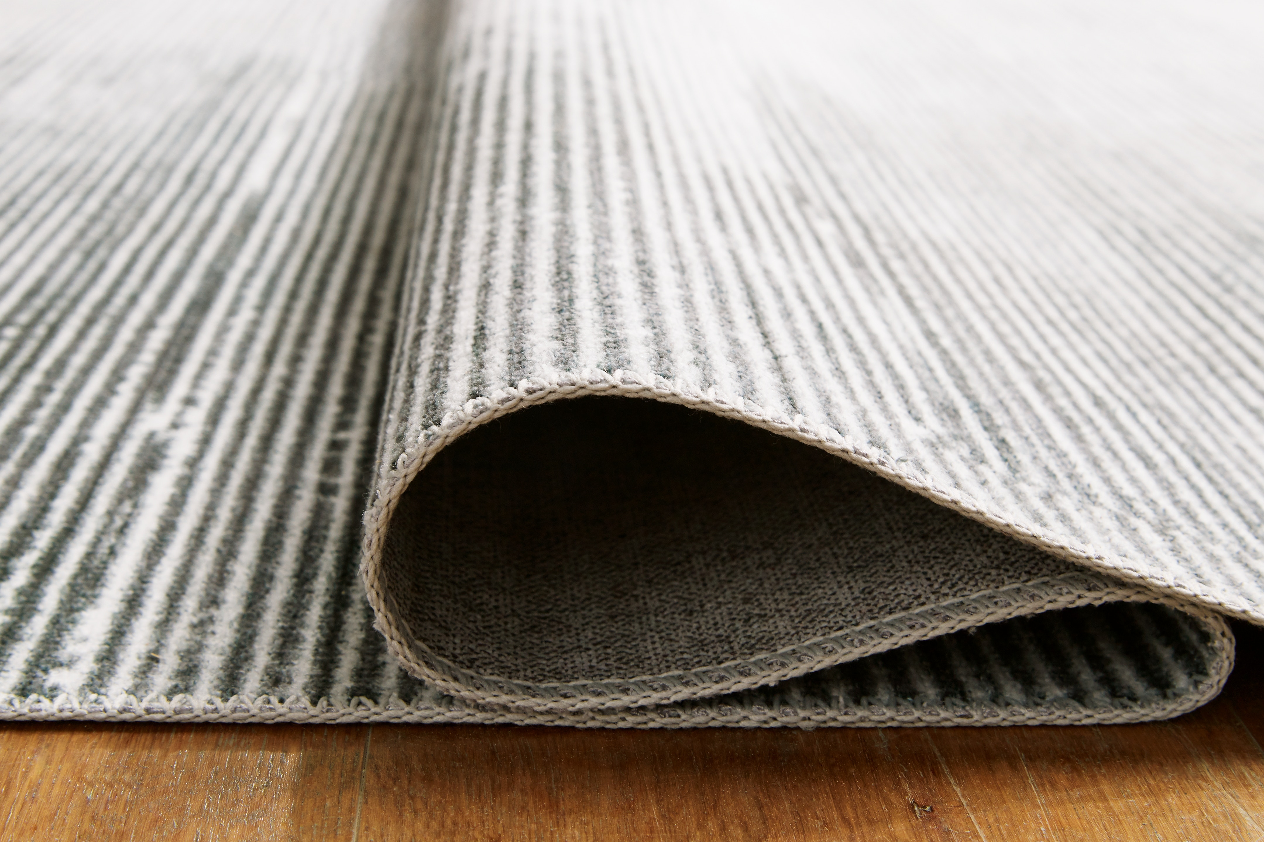 Signature Design by Ashley Area Rugs Milset 5'1" x 6'10" Washable Rug ...